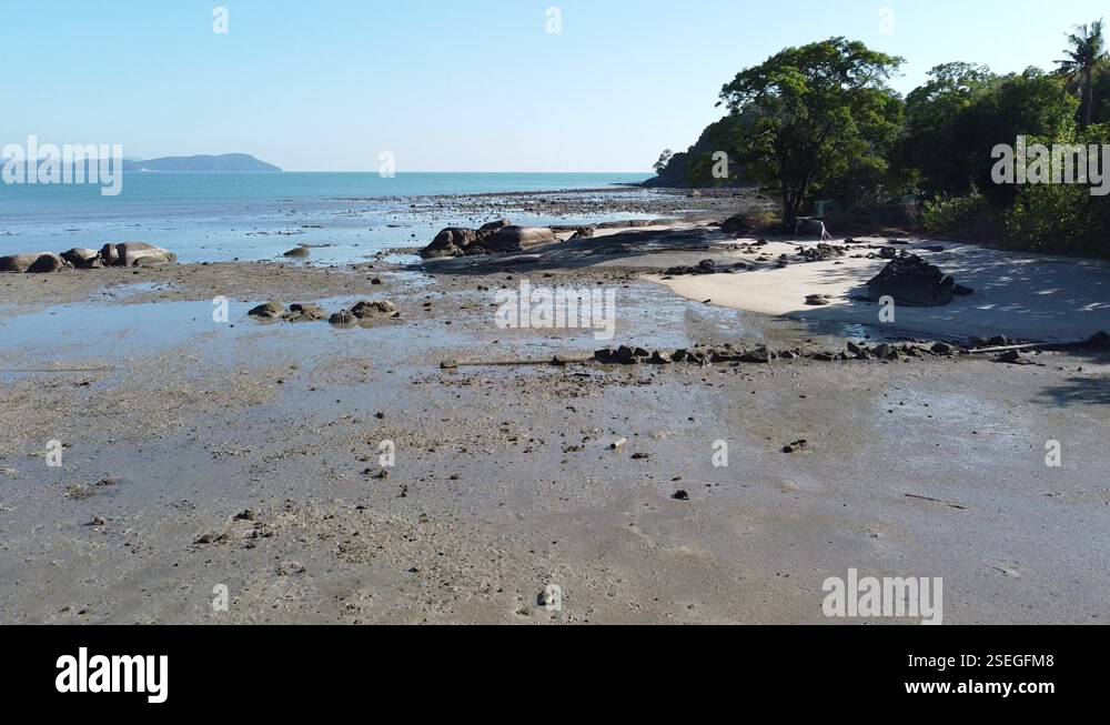 Drone fly over water and rock by the beach in Langkawi Island Malaysia ...