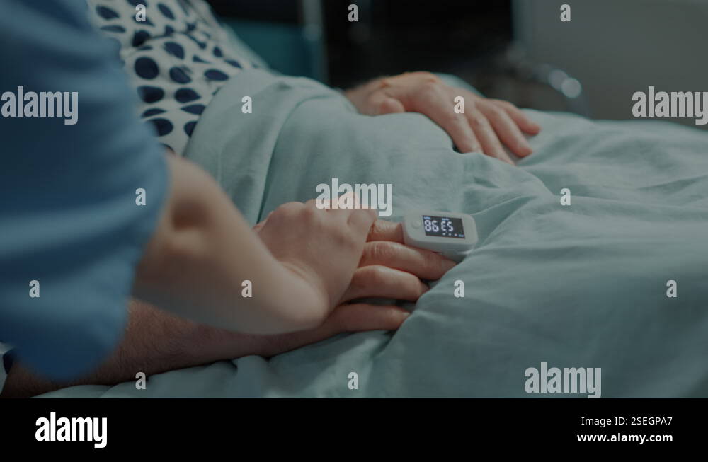 Elder patient getting help from nurse in hospital ward Stock Video ...