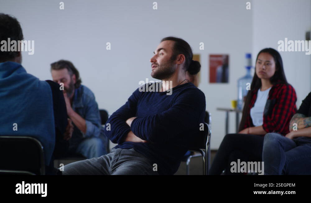 Adult guy telling story of drug addiction to group Stock Video Footage ...