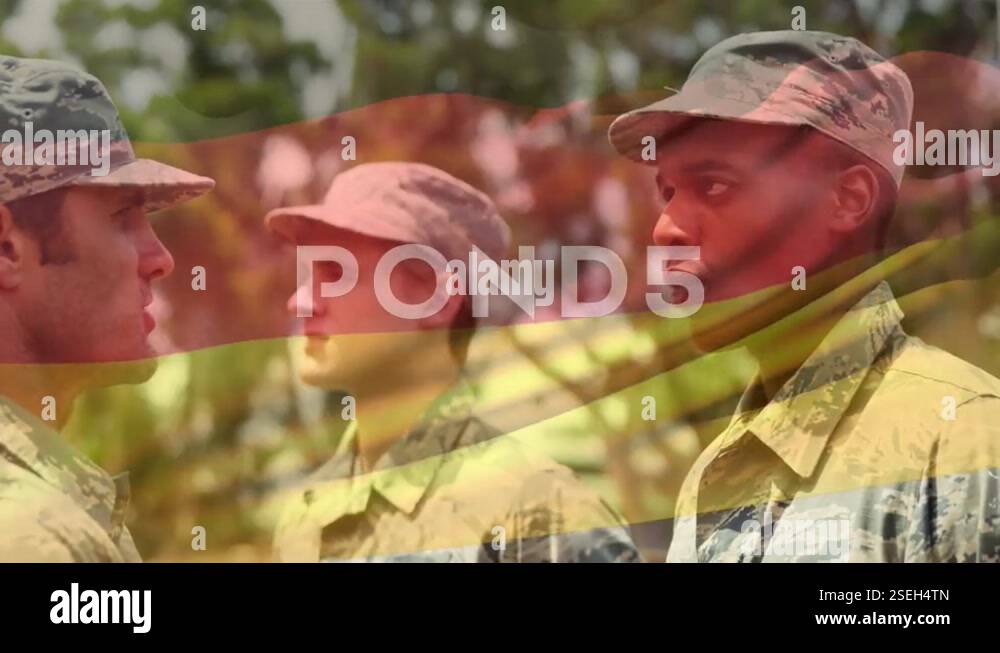 Digital composition of waving german flag against soldier saluting his ...