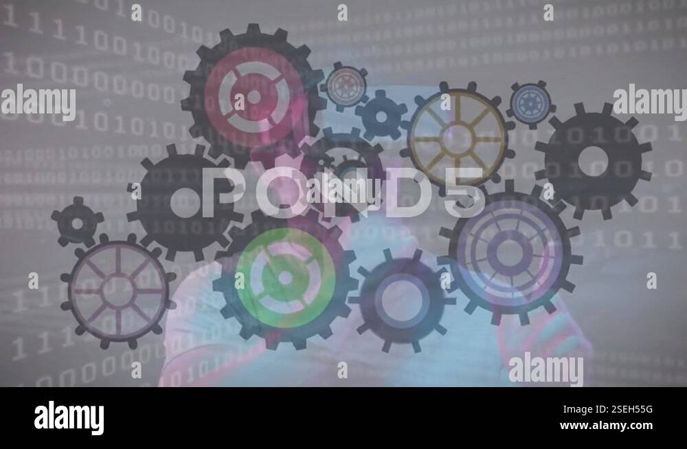 Animation of cogs spinning over binary coding and man wearing vr ...