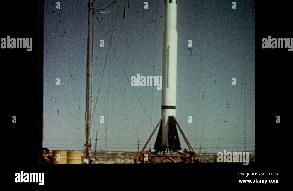 1950s: Rocket on launch pad, rocket launches. Image of Earth from space ...