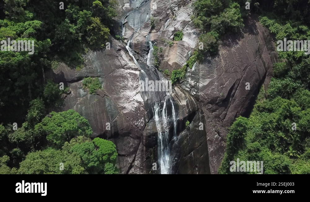 Seven Wells Waterfall flowing on rocks on Langkawi Island, Malaysia ...