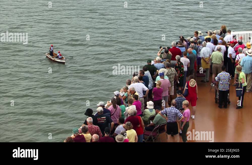 Passengers of a cruise ship watching the Panama Canal transit process ...