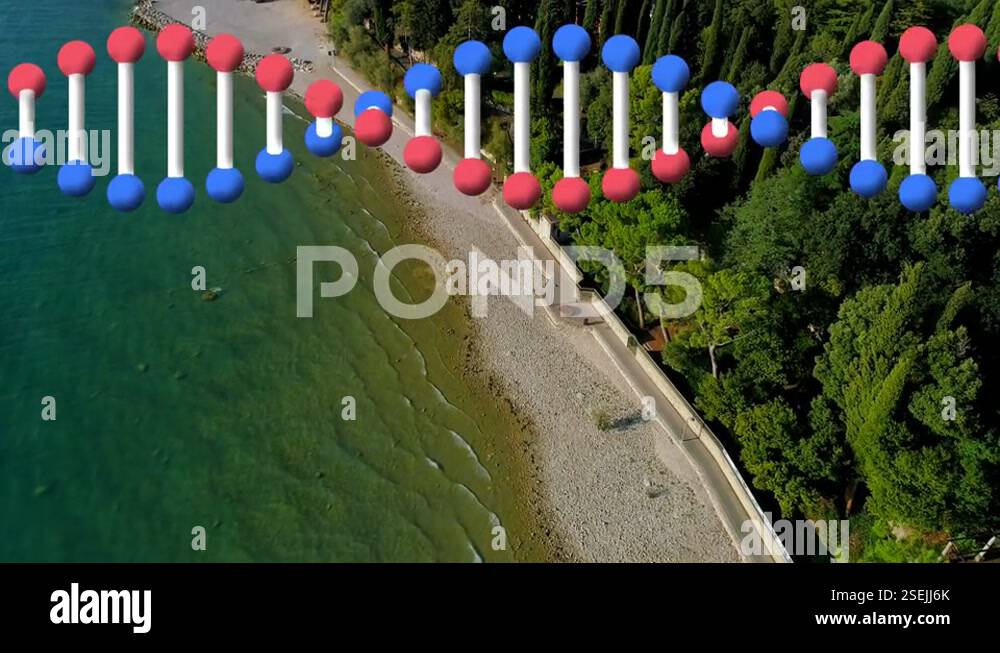 Digital composition of dna structure spinning against aerial view of ...