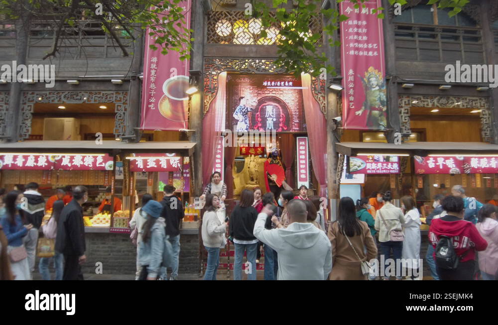 Tourists with masks visit cultural street - Kuanzhai Alley, Chengdu ...