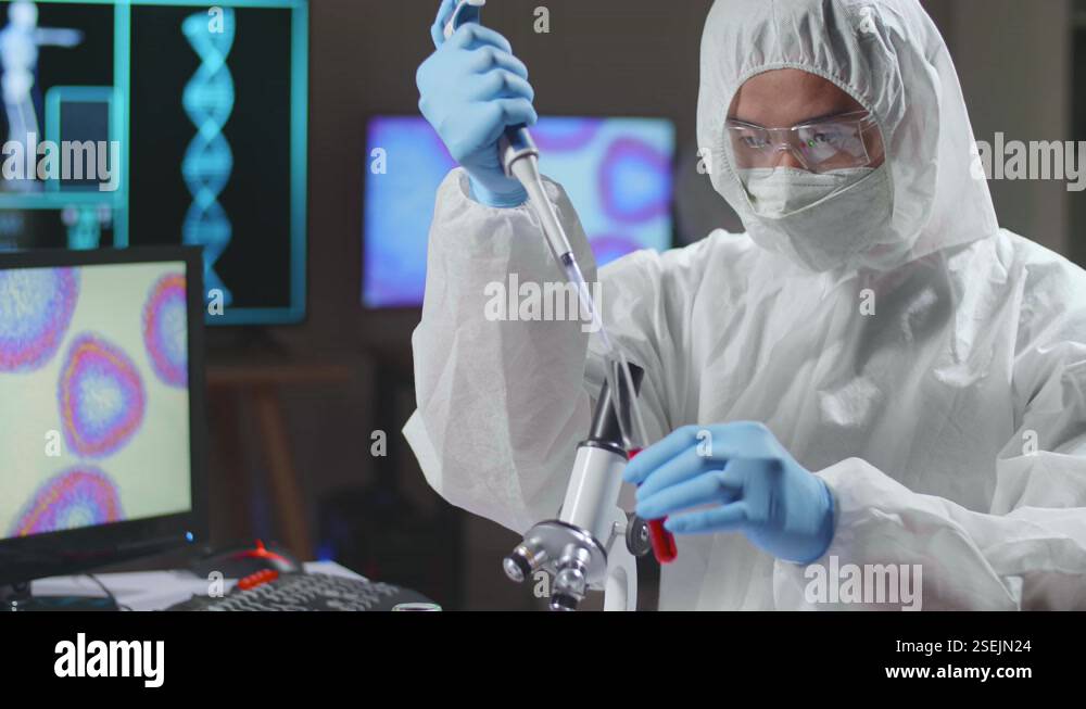 Asian Doctor In Protective Suit Is Doing A Science Experiments And Developing Stock Video ...
