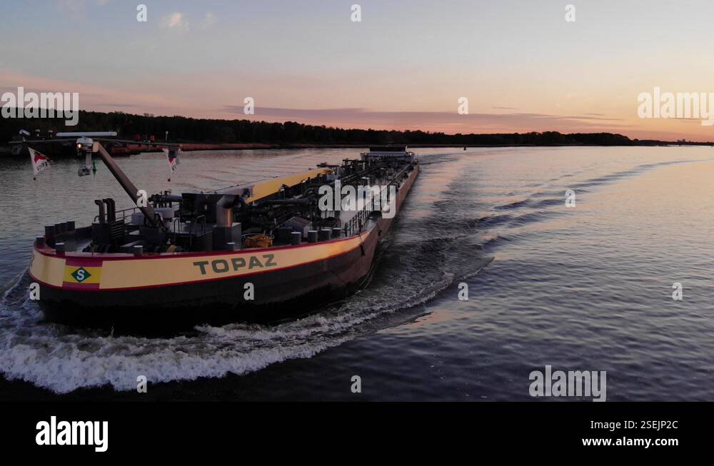 Crude Oil Tanker Ship Cruising On The Inlet During Golden Hour ...