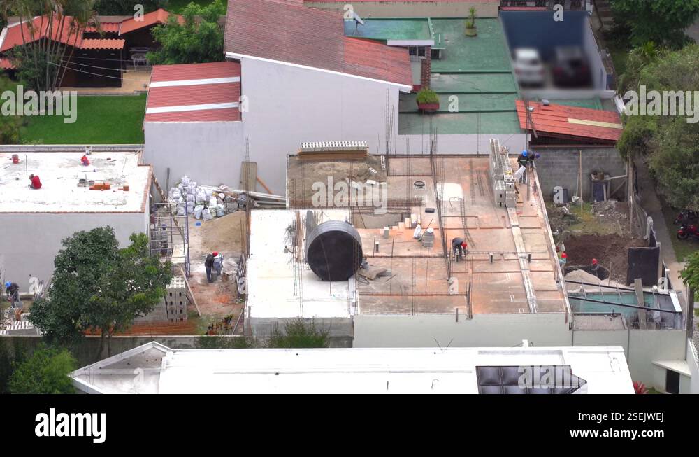 Aerial view of construction workers. Construction workers in latin ...