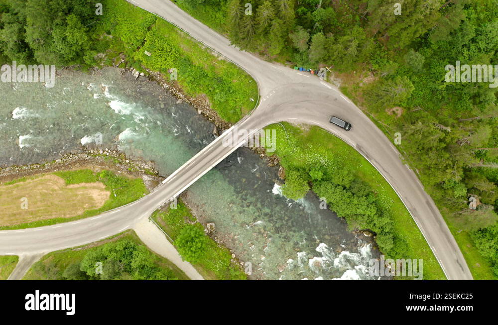 Vehicle Passes On Small Bridge Over Watercourse In Geiranger, Norway ...