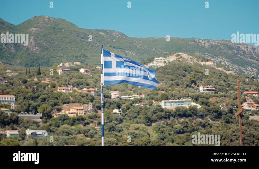 Blue Greek Symbol Flag On Wind.Blue Greek And Cross Flag Flutter Stock ...