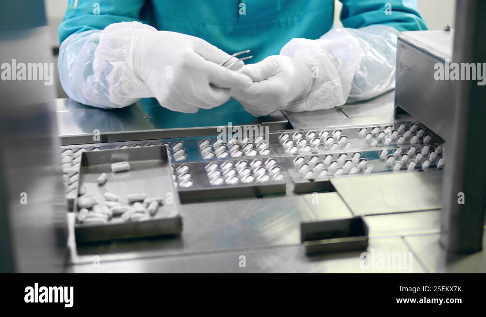 Defective capsule meds are getting replaced in the conveyor Stock Video ...