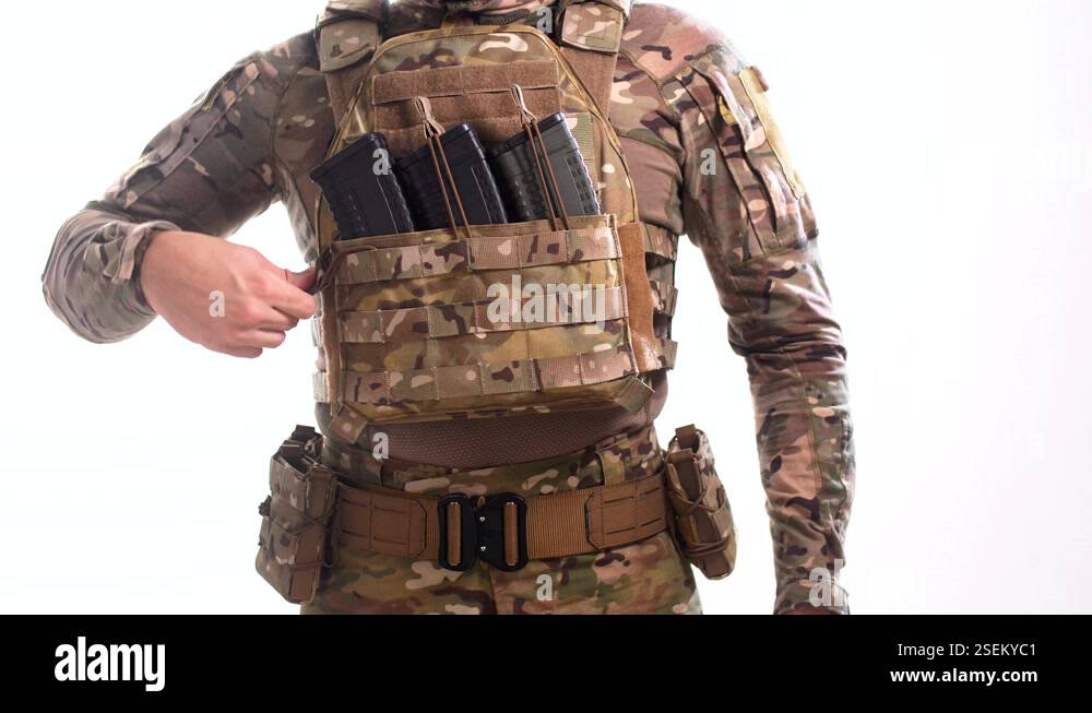 Soldier in plate carrier with rifle magazines Stock Video Footage - Alamy