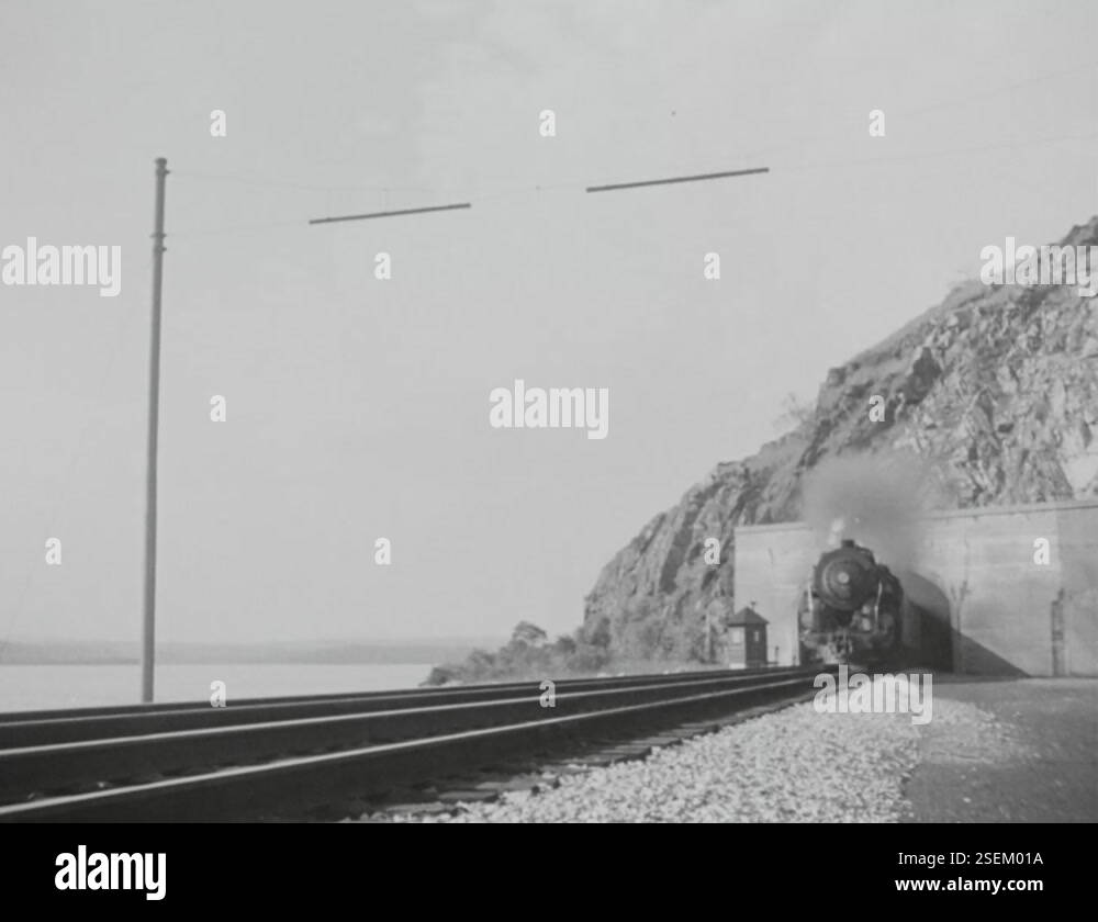 1940s: Train emerges from tunnel Stock Video Footage - Alamy