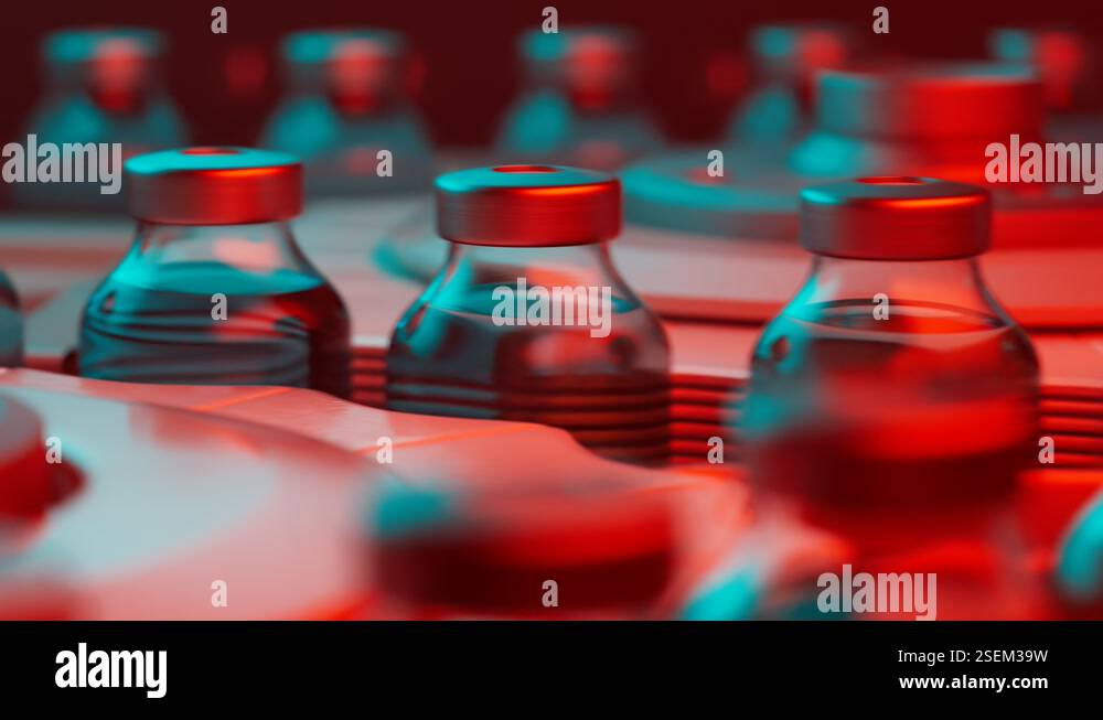 Blue vaccine bottles on the conveyor belt. Concept of COVID-19 ...