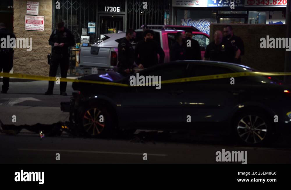 police officers investigating a car crash Stock Video Footage - Alamy