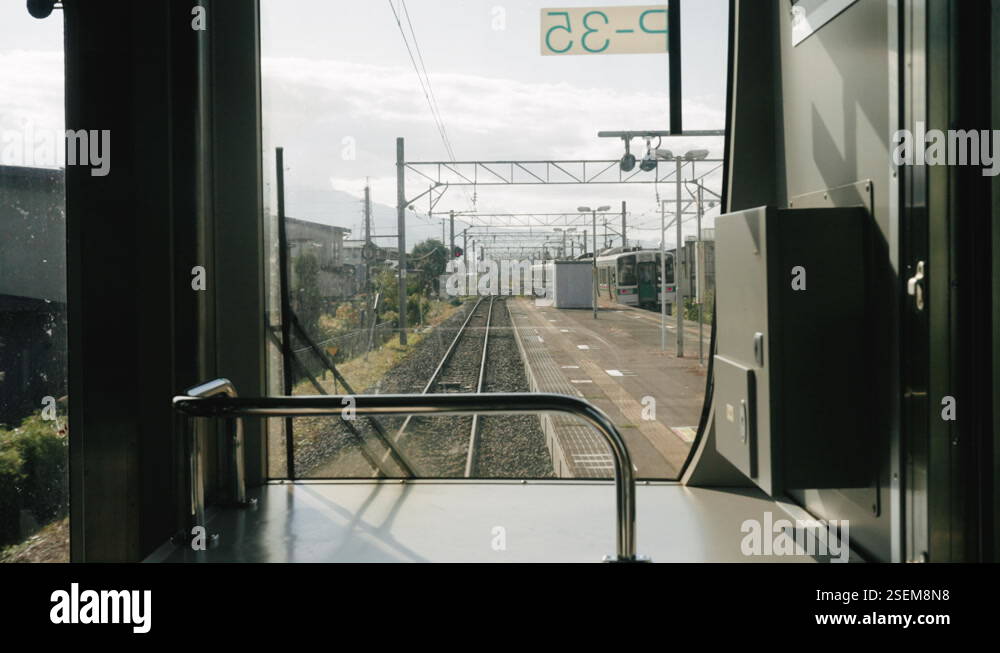 View From The Glass Window Of Traveling Train On Railroad At Sunny Day ...