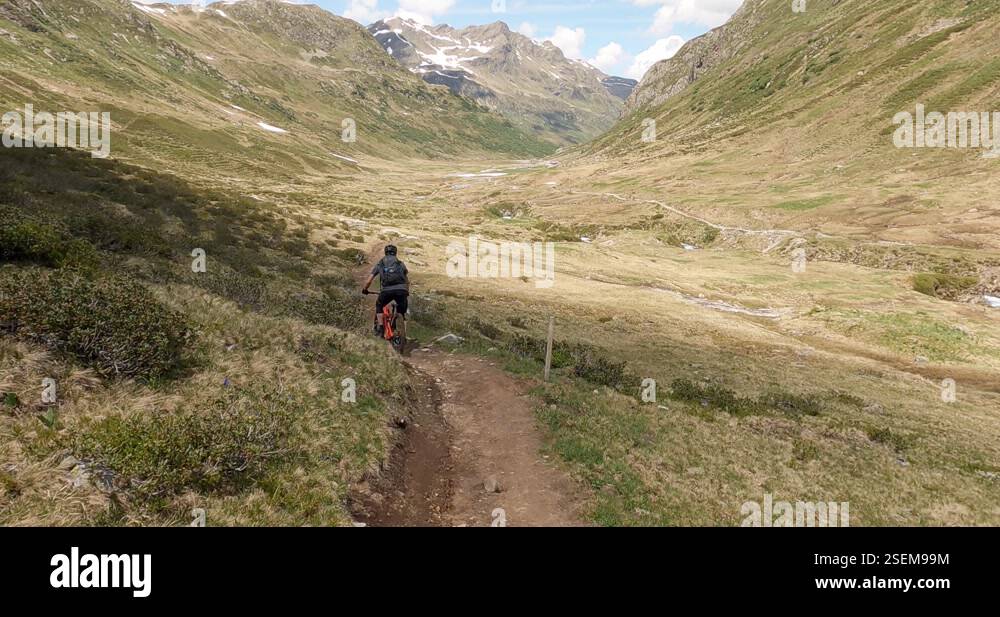 Enduro mountain biking on a single trail with a MTB in beautiful ...