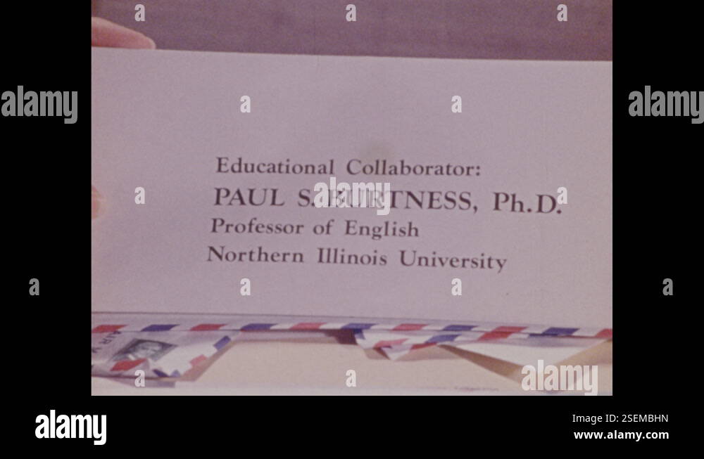 1970s: Woman collects envelopes. Titles on envelope. Person puts stamps ...