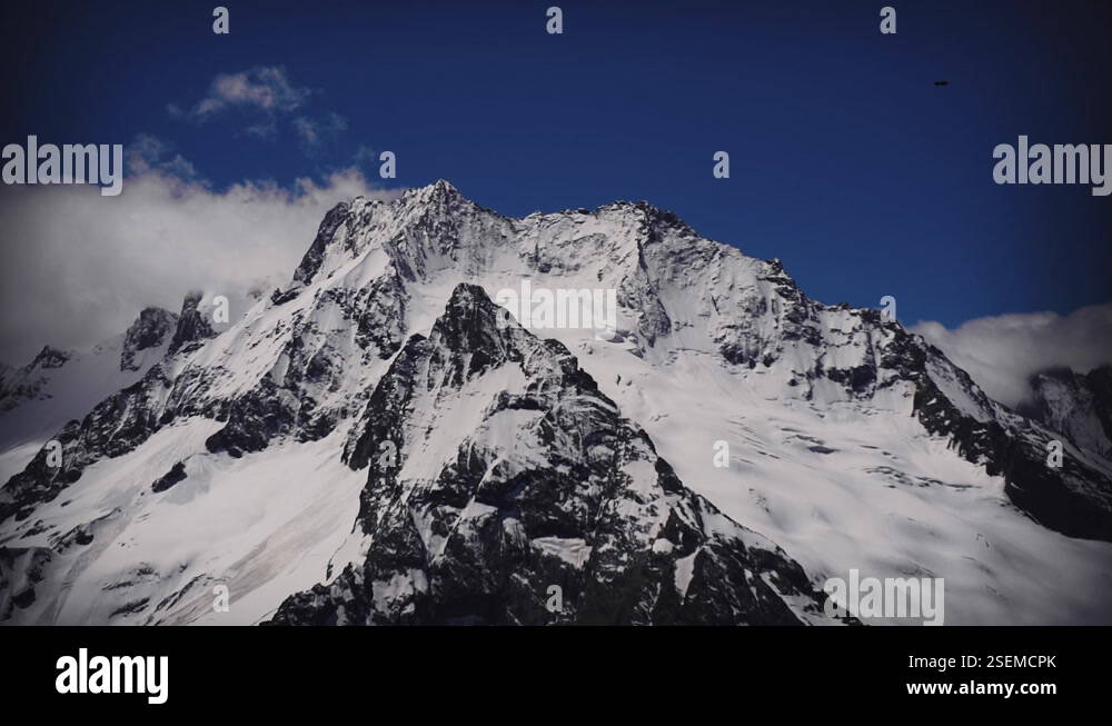 Sharp Peaks of Mountain Ridge under Snow. Close Up View Stock Video ...