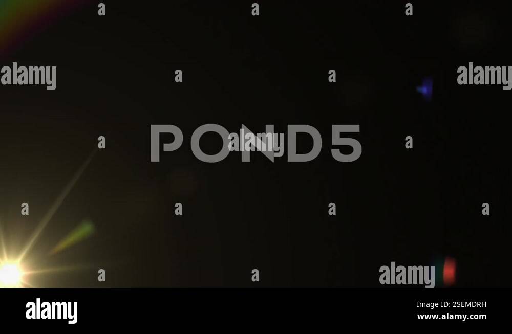 Digital animation of spot of light and lens flare against black ...