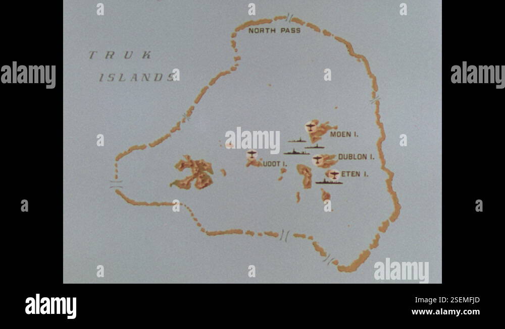 1940s: Map of military bases in the Truk Islands. Men with flags on ...
