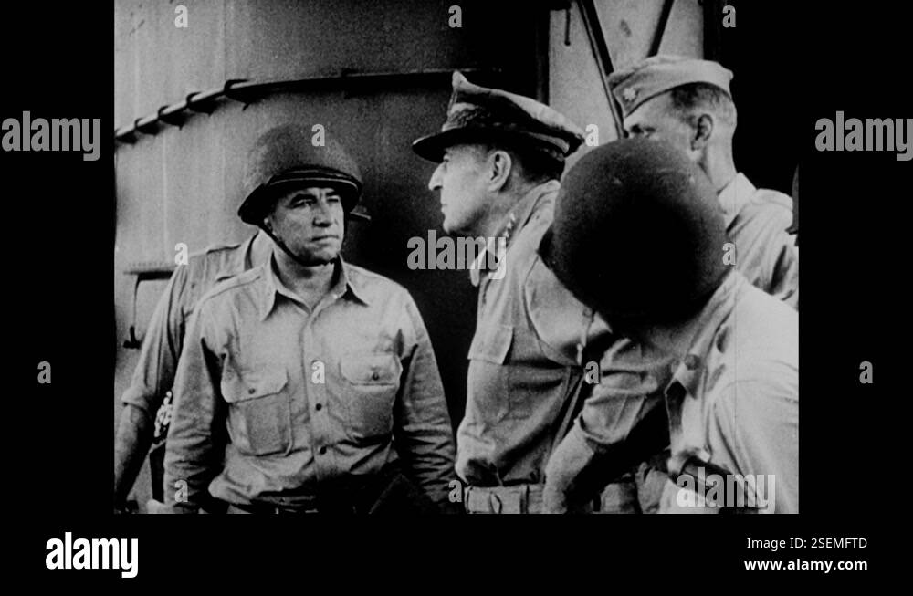 1940s: Soldiers salute and talk to military officer. Lines appears on ...