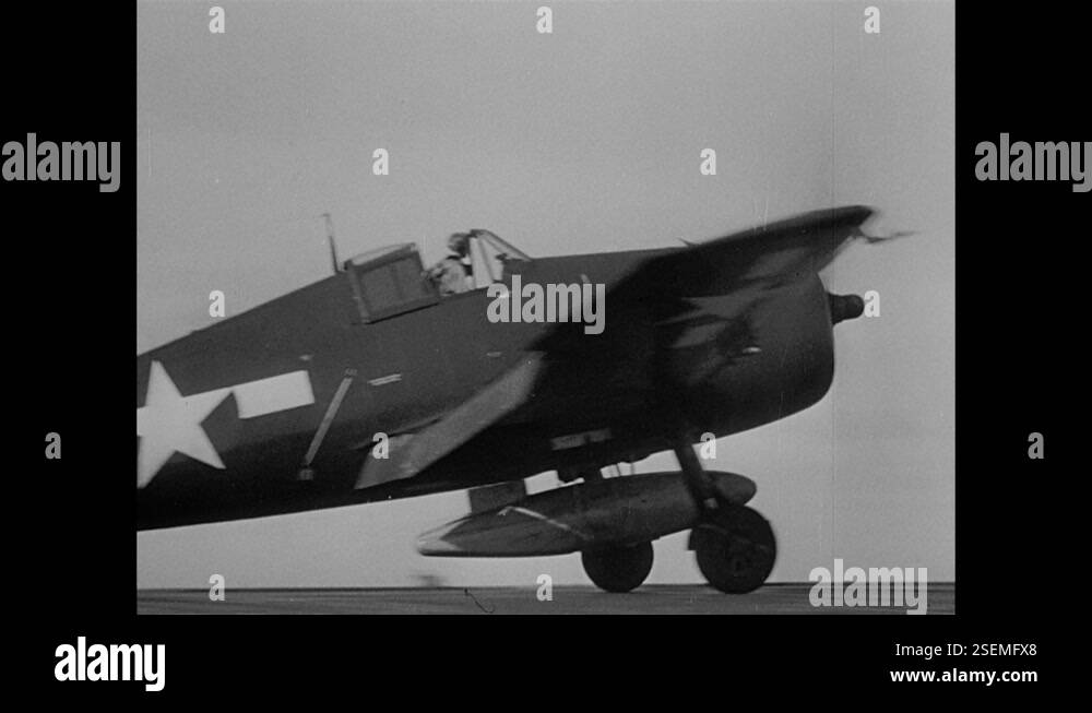 1940s: Man waves plane to take off. Planes take off from aircraft ...