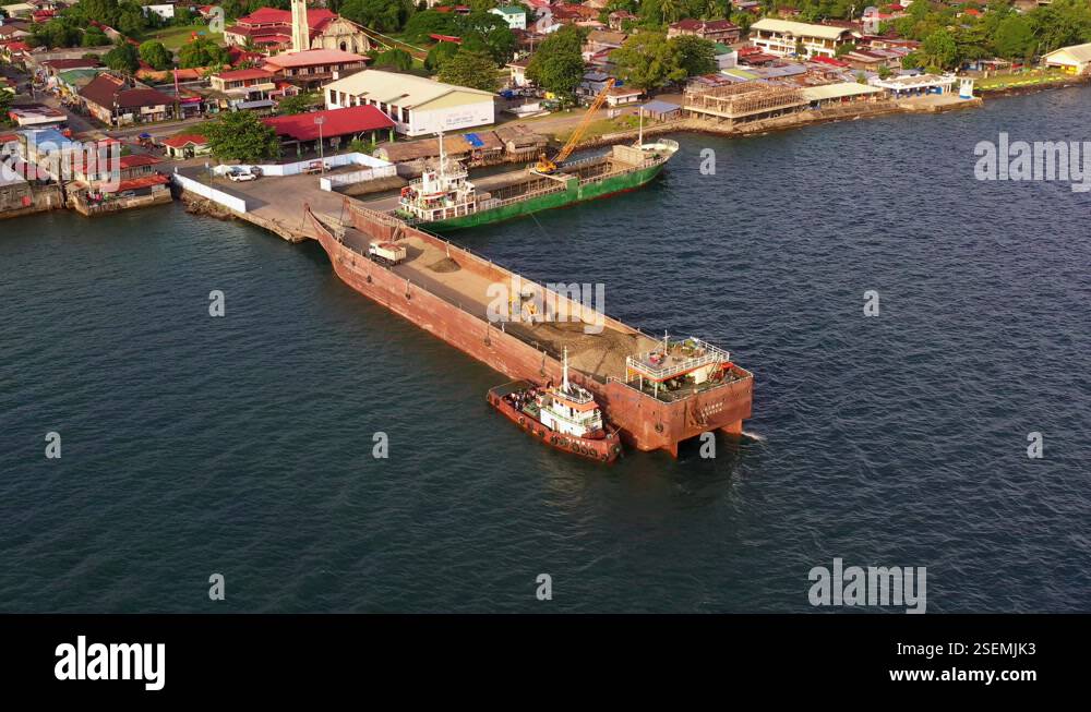 Trucks And Loaders Loading Dry Bulk Cargo Barge At The Port. - aerial ...