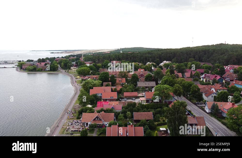 Architecture of resort town Nida in aerial descending view Stock Video ...