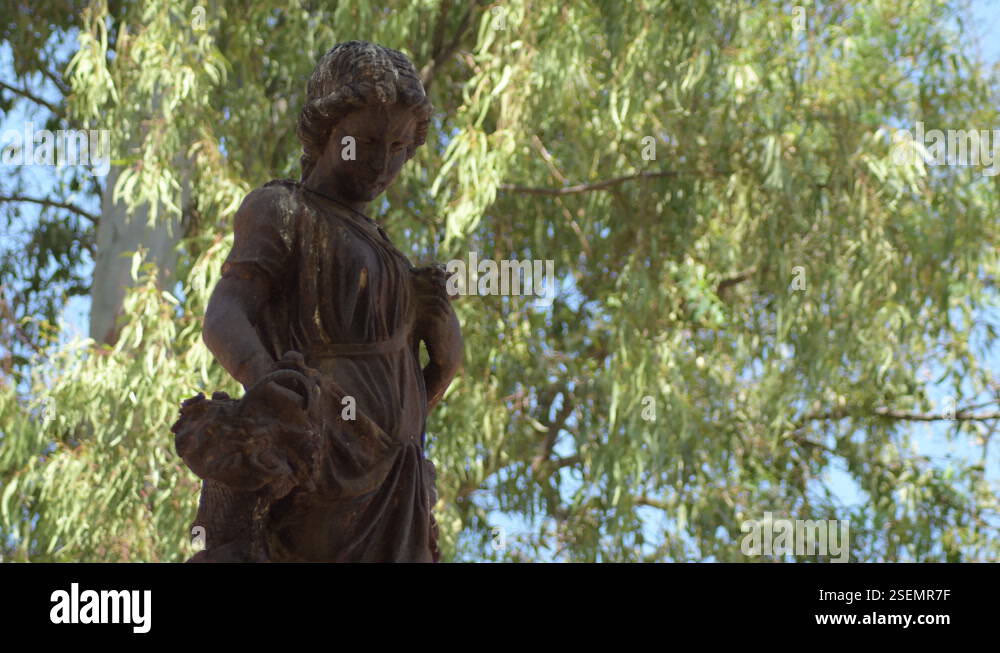 Woman statue classic figure in a garden Stock Video Footage - Alamy