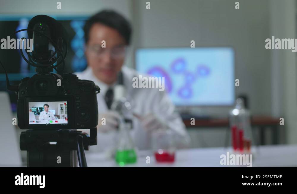 Camera Display Of Asian Scientist Researching In The Laboratory With ...