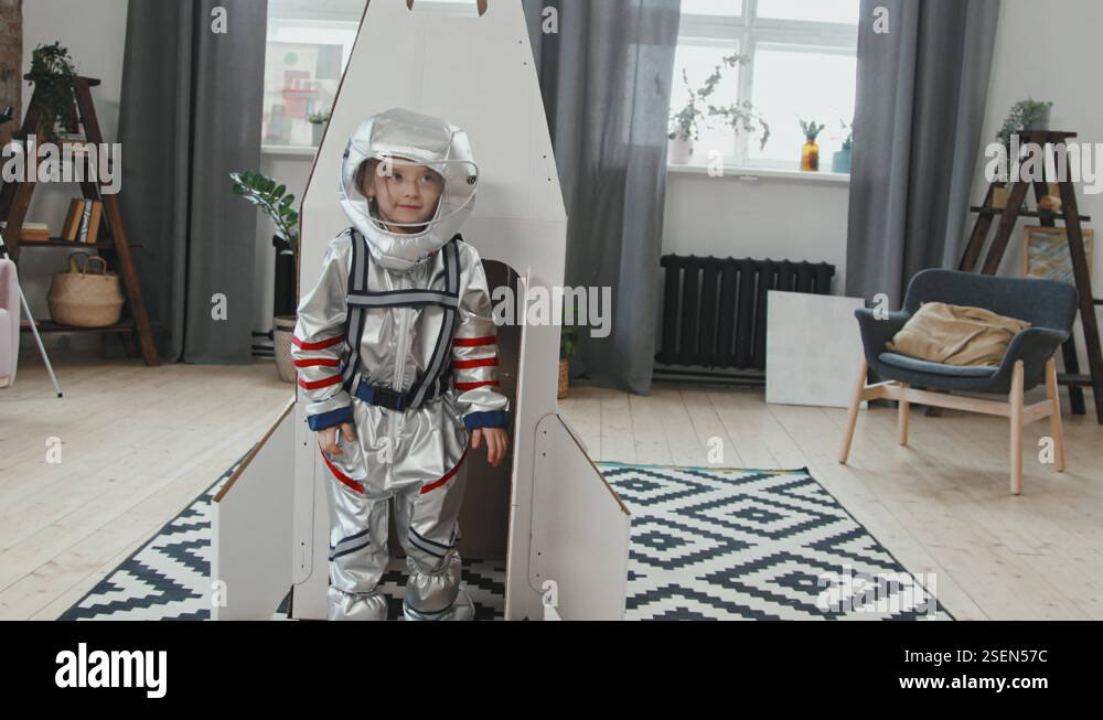 Cute Girl in Spacesuit Exiting Rocket Ship and Waving Stock Video ...