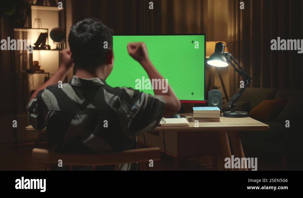 Young Asian Boy Student Celebrating With Mock Up Computer Green Screen ...
