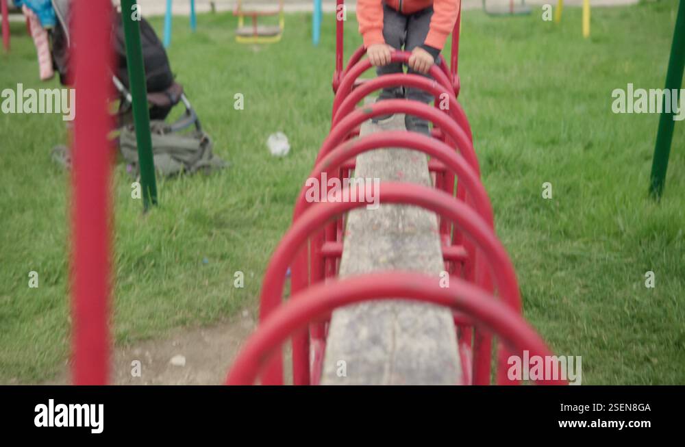 Cute pretty Preschool children climb swing train on playground. Little ...
