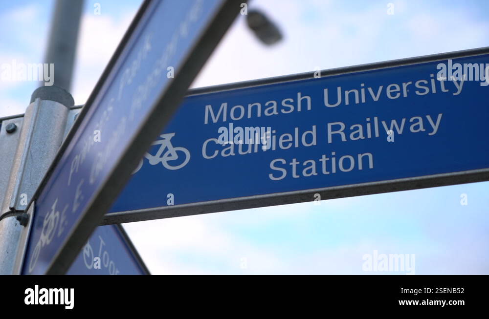 Directional arrow sign of Monash University and Caulfield Railway ...