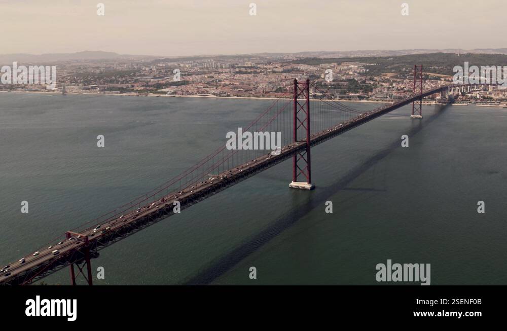 The 25 de Abril Bridge, suspension bridge over Tagus river connecting ...