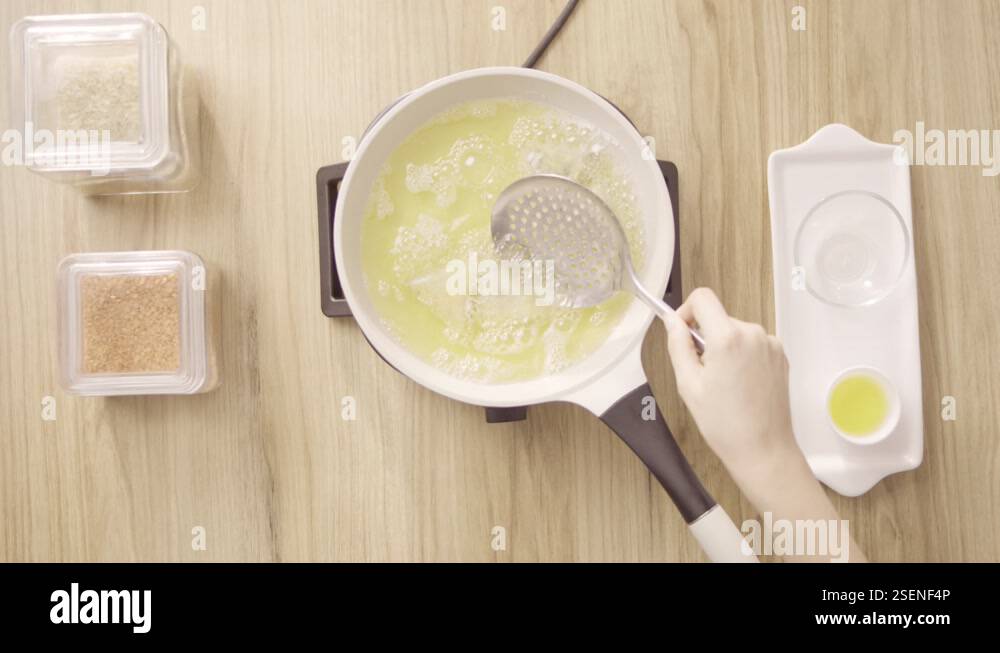 Frying Moroccan food in boiling oil on an electric stove, top view ...