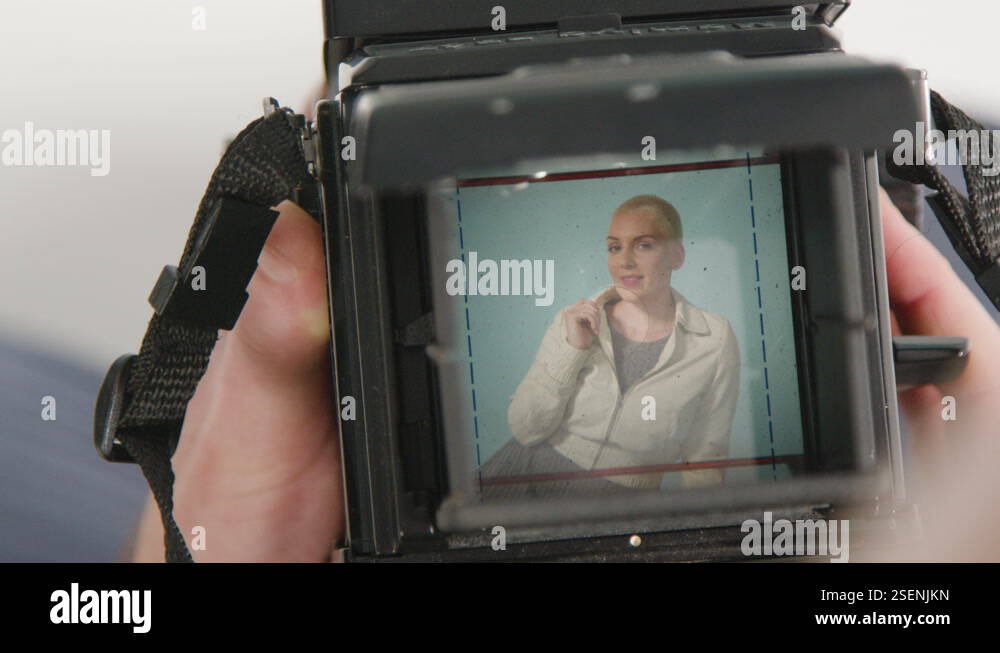 Female model poses for medium format camera viewfinder 03 Stock Video ...