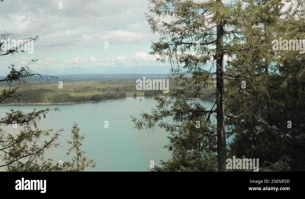Overlooking the beautiful Comox Lake from a mountain cliff on the south ...