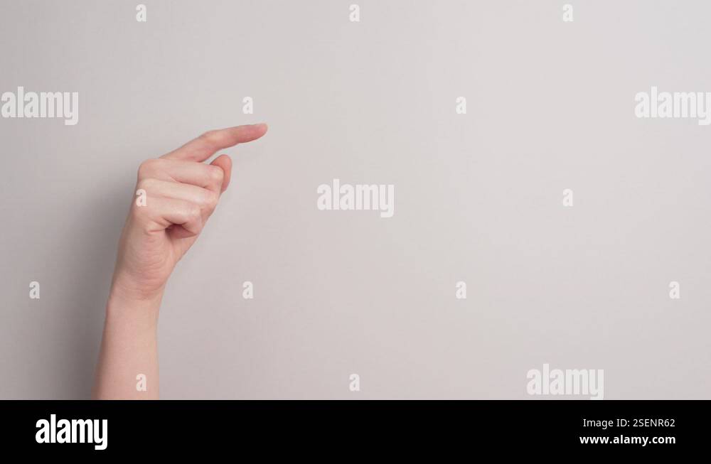 Human Hand Gesticulating And Poking Index Finger In Plain Studio Stock ...