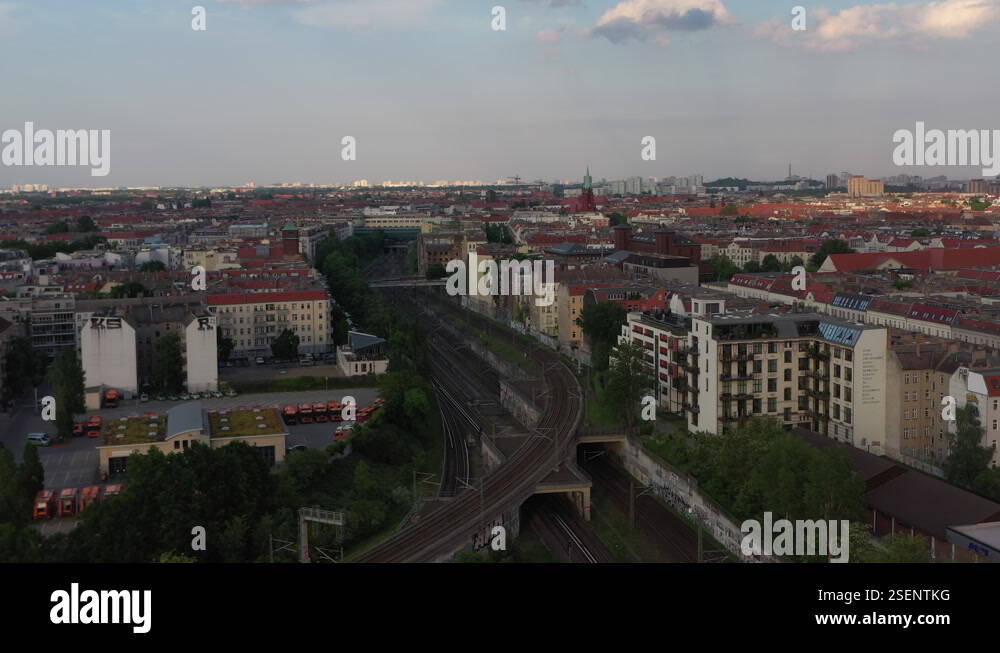 Forwards fly above railway junction. Tracks leading between residential ...