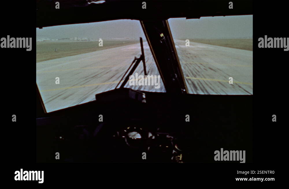 1960s: pilot and co-pilot in cockpit taking bomber down runway to start ...