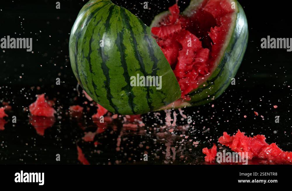 Super Slow Motion Shot of Falling and Cracking Whole Water Melon at ...