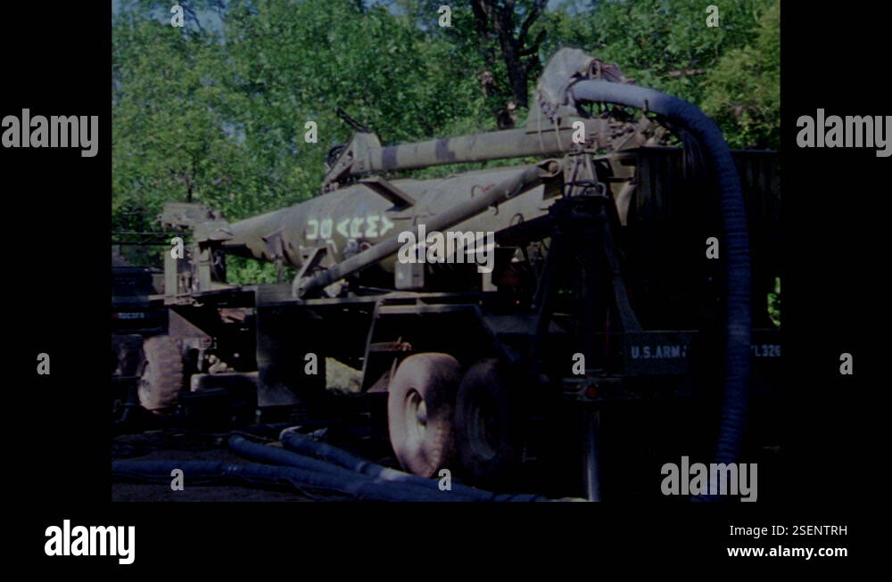 1970s: Cable connects vehicles. Control panel. Missile fins move. Man ...