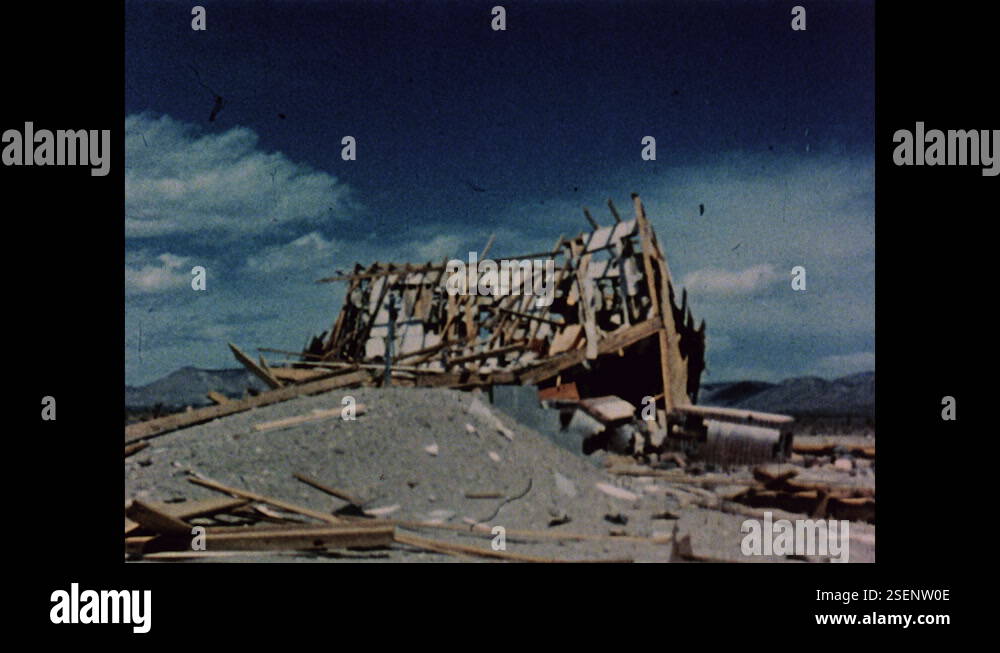 1960s: Exterior of house smoking, catching fire. House exploding. Ruins ...