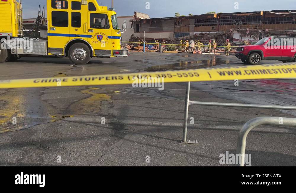 Firefighters arrive to grocery storefront collapse emergency scene ...