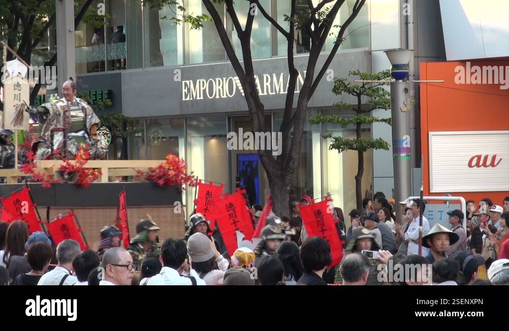 Japanese samurai and Western fashion brand during a festival in Nagoya ...