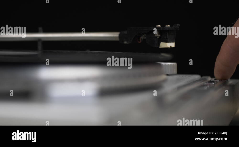 Man presses the button to turn off the turntable Stock Video Footage ...