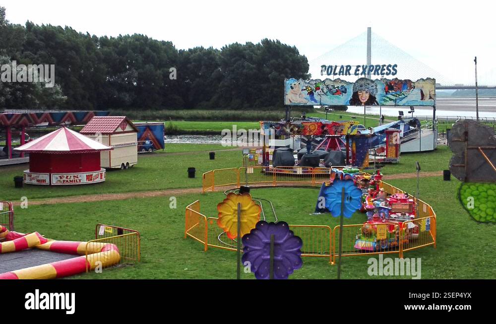 Empty overcast British amusement park aerial view deserted funfair ...